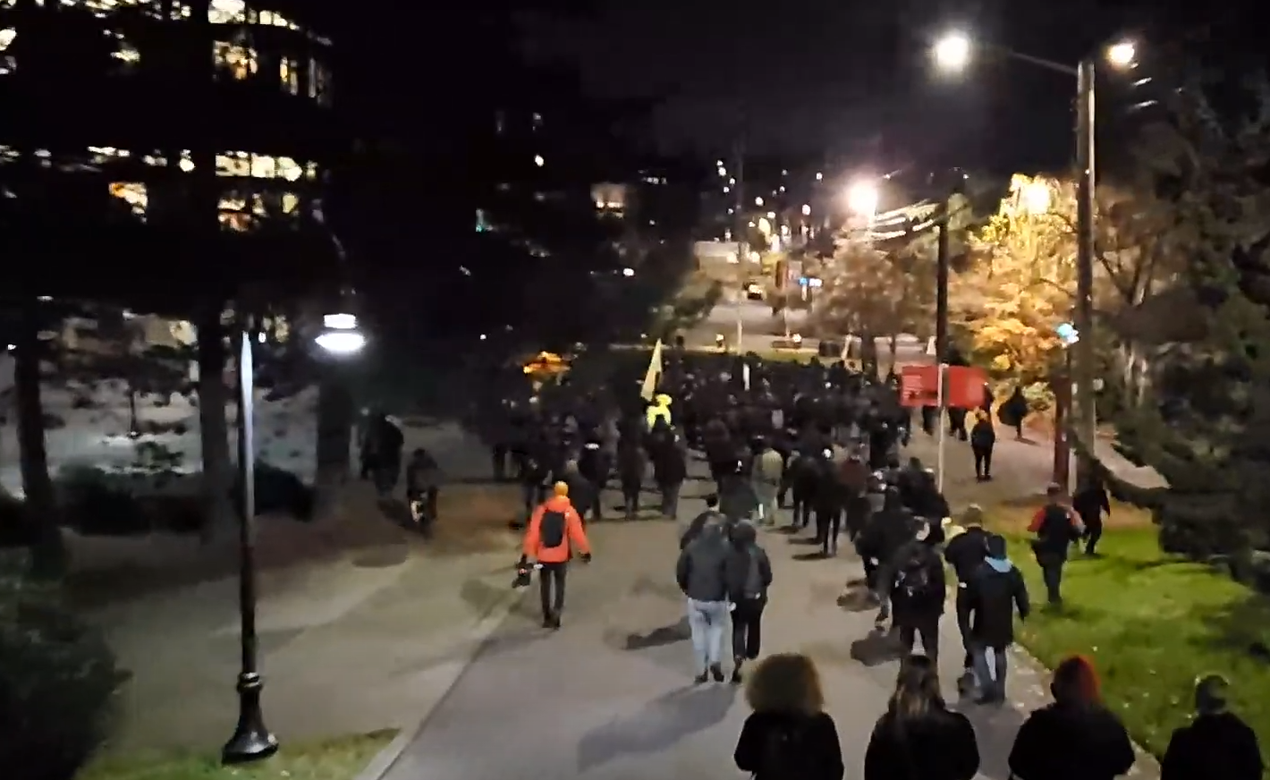 Protesters march in Seattle for 21st anniversary of WTO riots ...